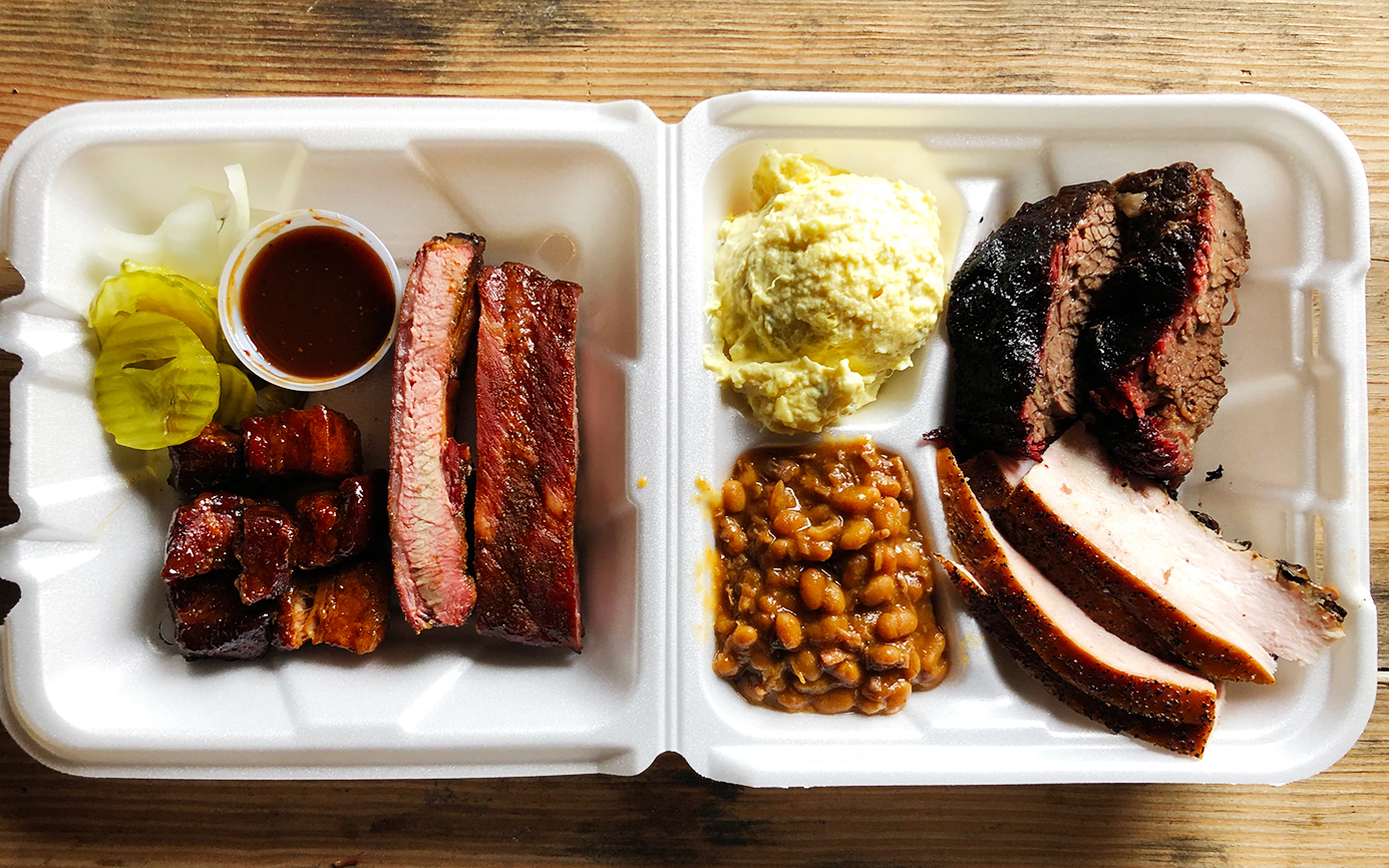 Stiky Ribz BBQ Piles Plates With Towering Sandwiches, Rich Sides ...
