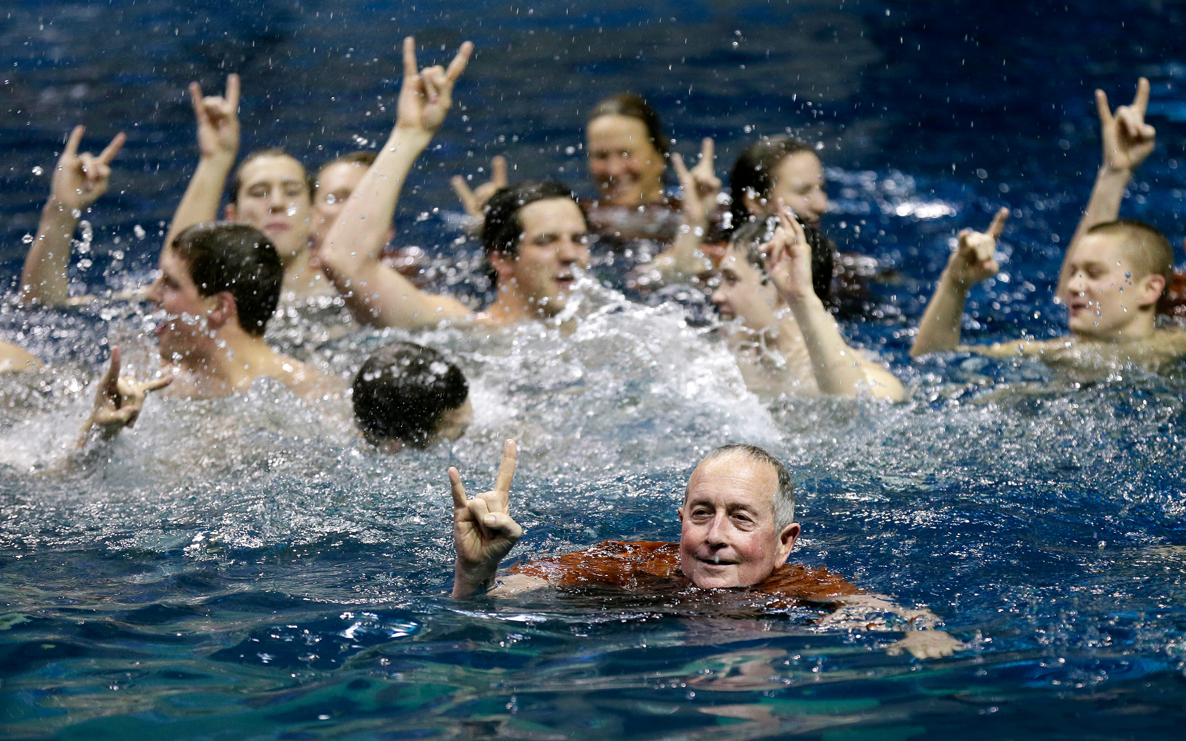 After the World's Shortest Retirement, UT Swim Coach Comes Back for More